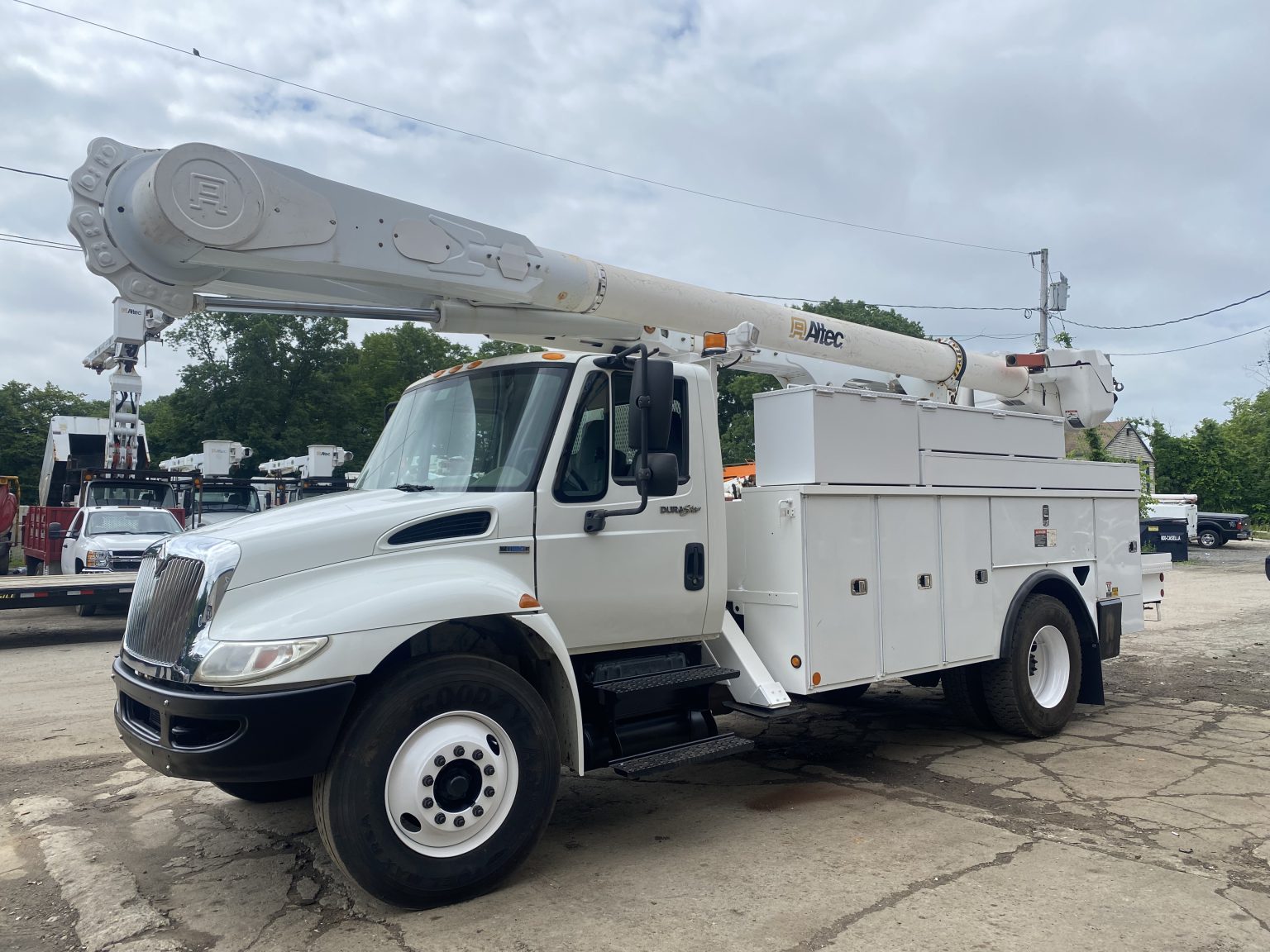 2009 International 4300 Altec AM55 Material Handler Bucket Truck - Platinum Truck and Equipment